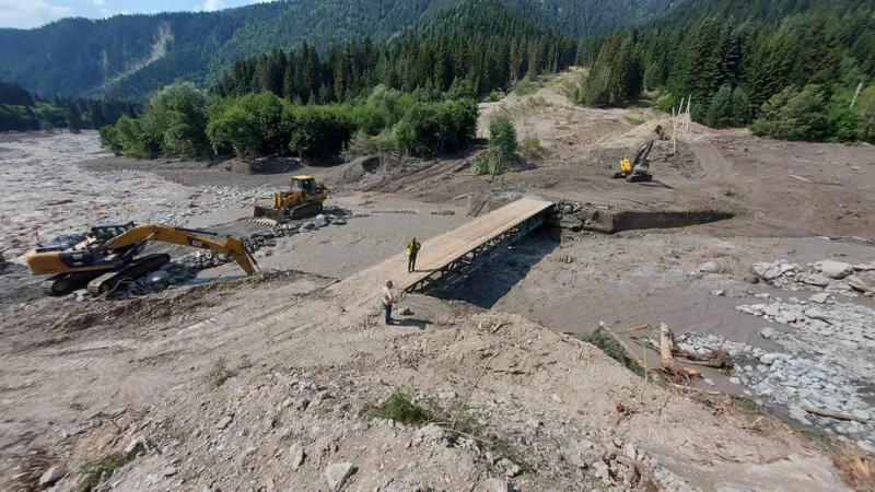 A temporary access bridge to the Shovi disaster zone arranged